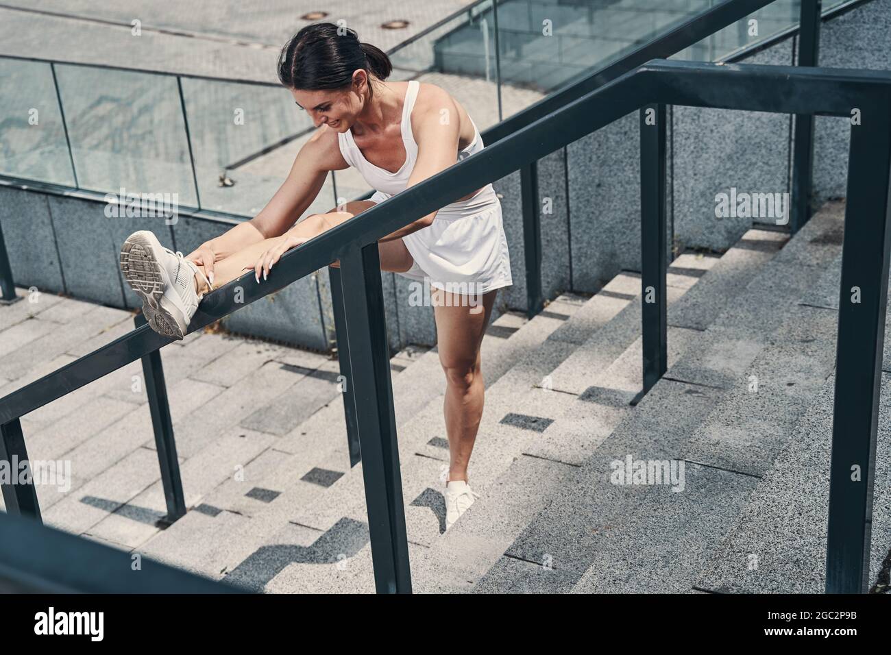 Touching leg hi-res stock photography and images - Alamy