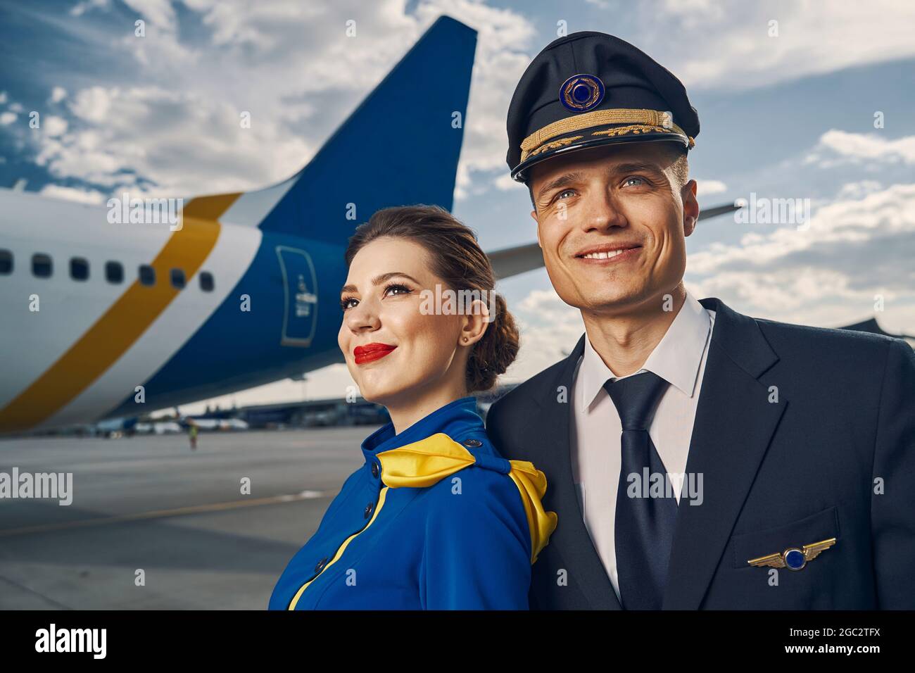 Female pilot standing outside of plane hi-res stock photography and ...