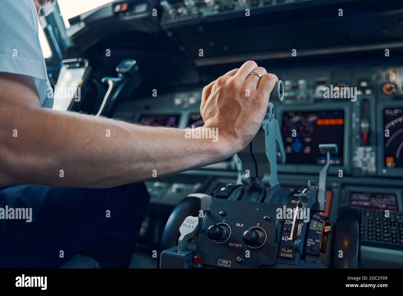 Experienced airline captain increasing the engine thrust Stock Photo ...
