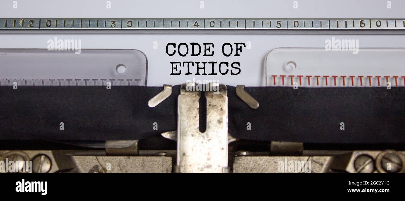 Code of ethics symbol. Words 'Code of ethics' typed on retro typewriter ...