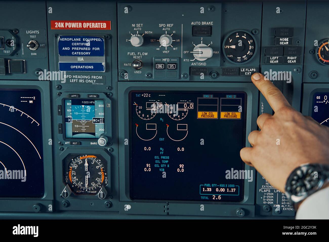 Professional Caucasian airline captain navigating an airplane Stock ...