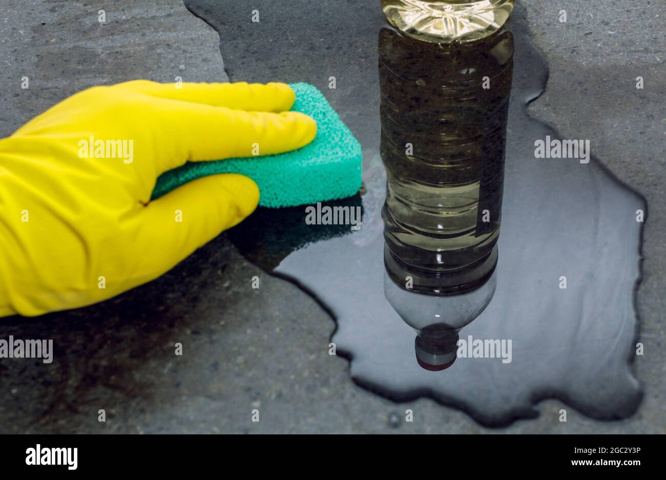Woman cleaning a surface Stock Photo - Alamy