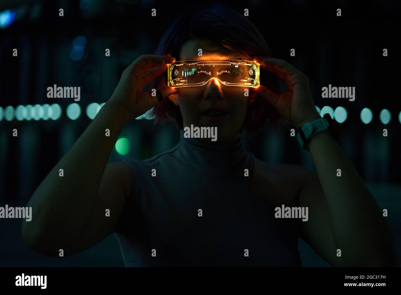 Cyberpunk style portrait of beautiful young woman in futuristic costume ...