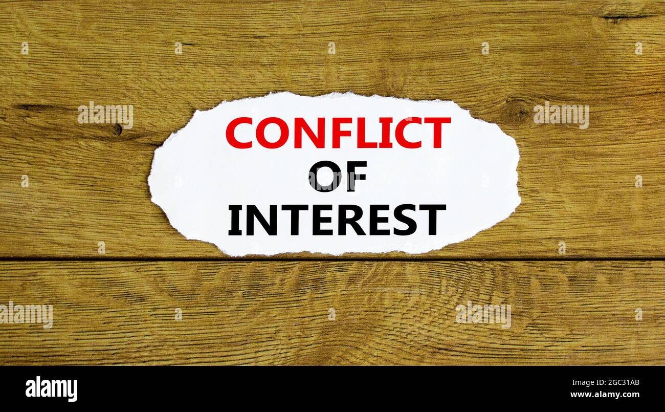 Conflict of interest symbol. Words 'Conflict of interest' on white ...