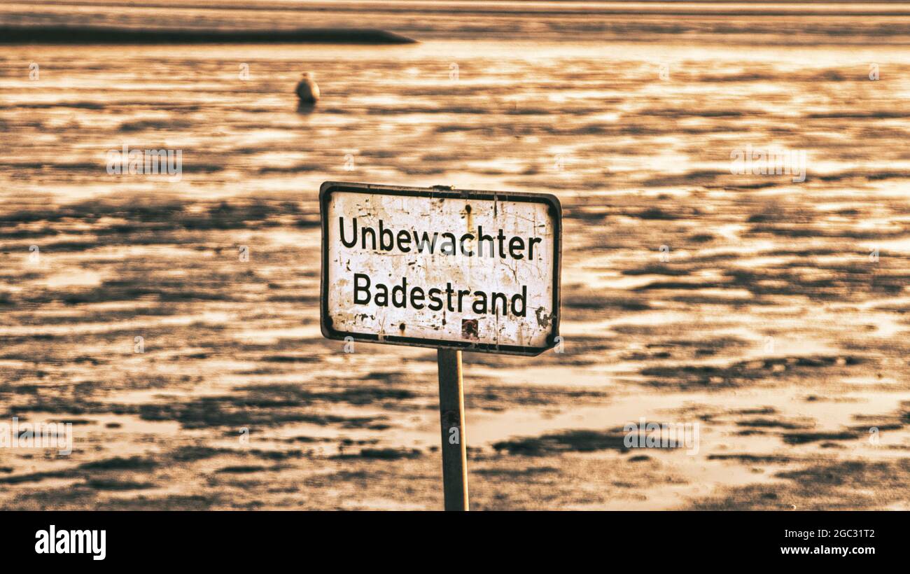 Unguarded beach sign hi-res stock photography and images - Alamy