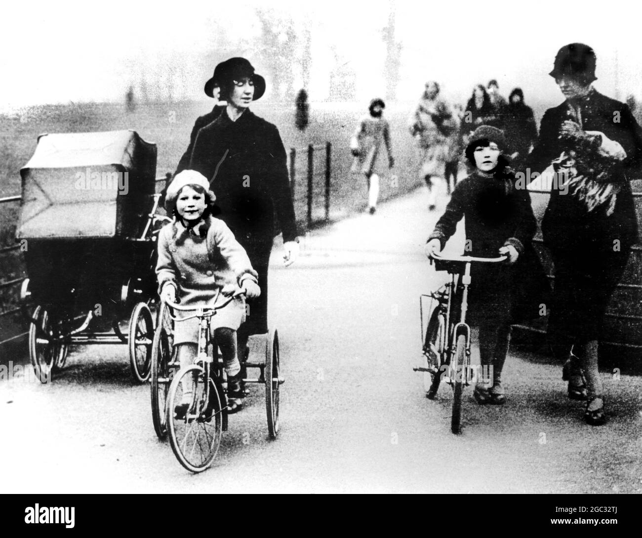 Princess Elizabeth on her new tricycle in Hyde Park, her sister ...
