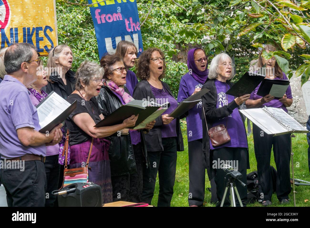 London, UK. 6th August 2021. Raised Voices sing a Japanese song about ...