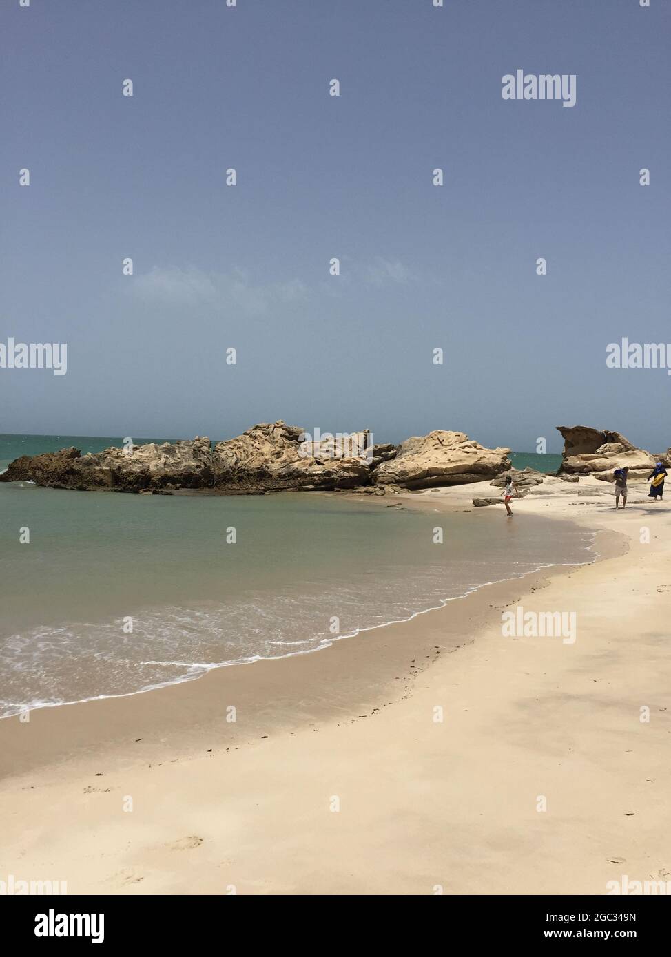DAKHLA, MOROCCO - Jul 11, 2019: The ocean waves hitting the sandy Porto ...