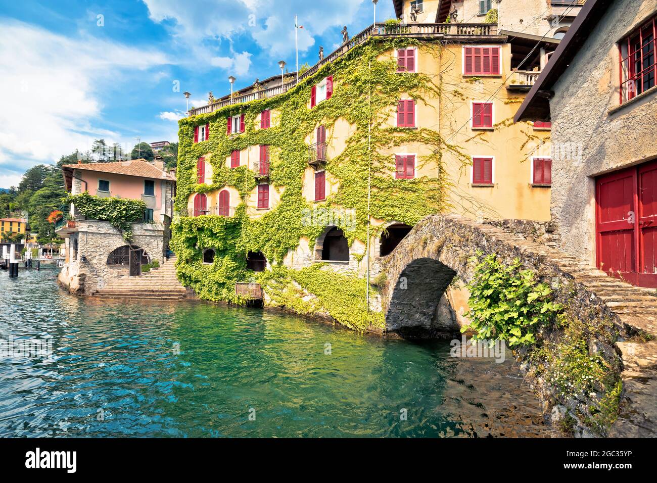 Town of Nesso historic stone bridge and waterfront on Como Lake ...