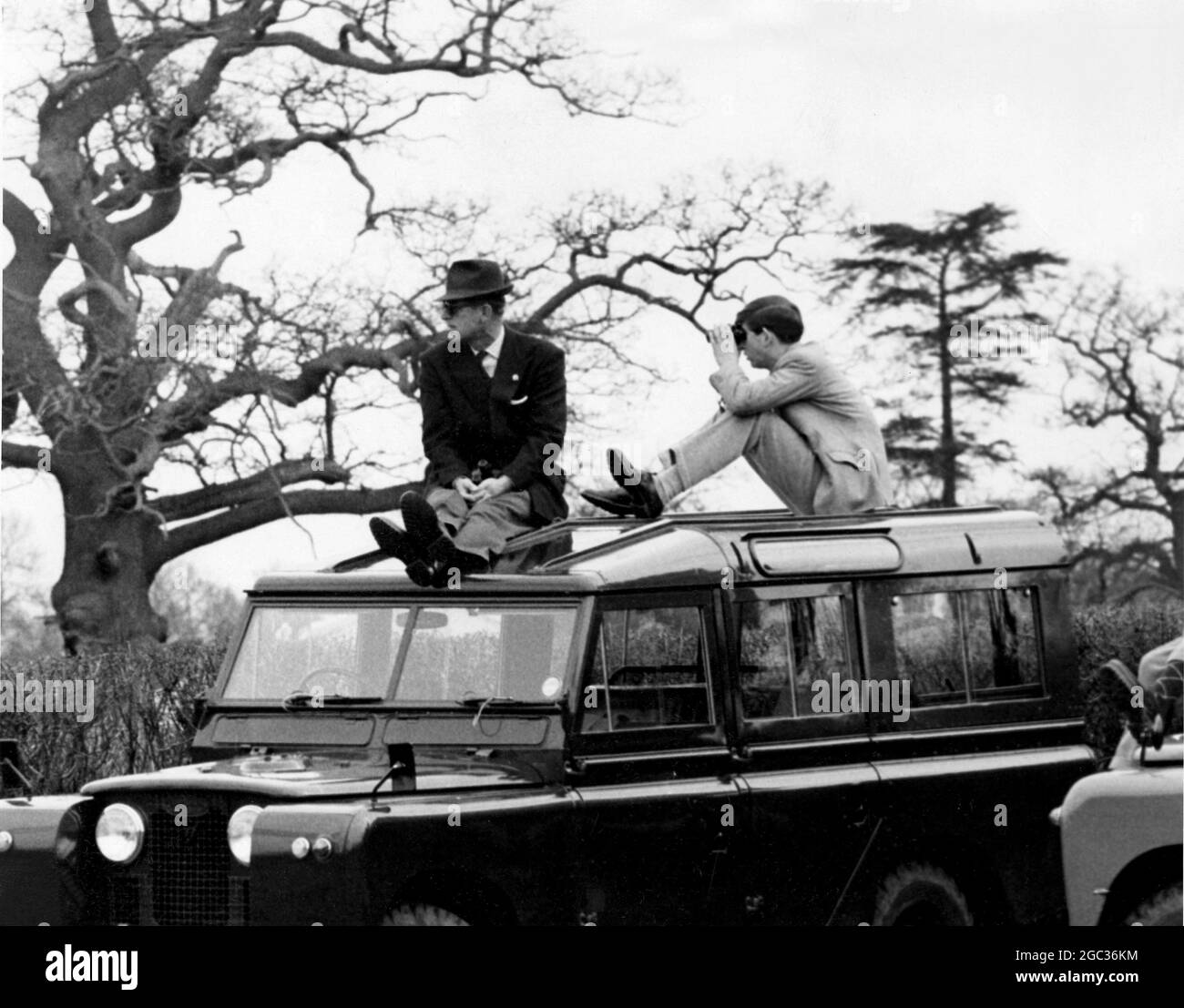 Prince Charles with Prince Phillip on the land rover roof to watch ...