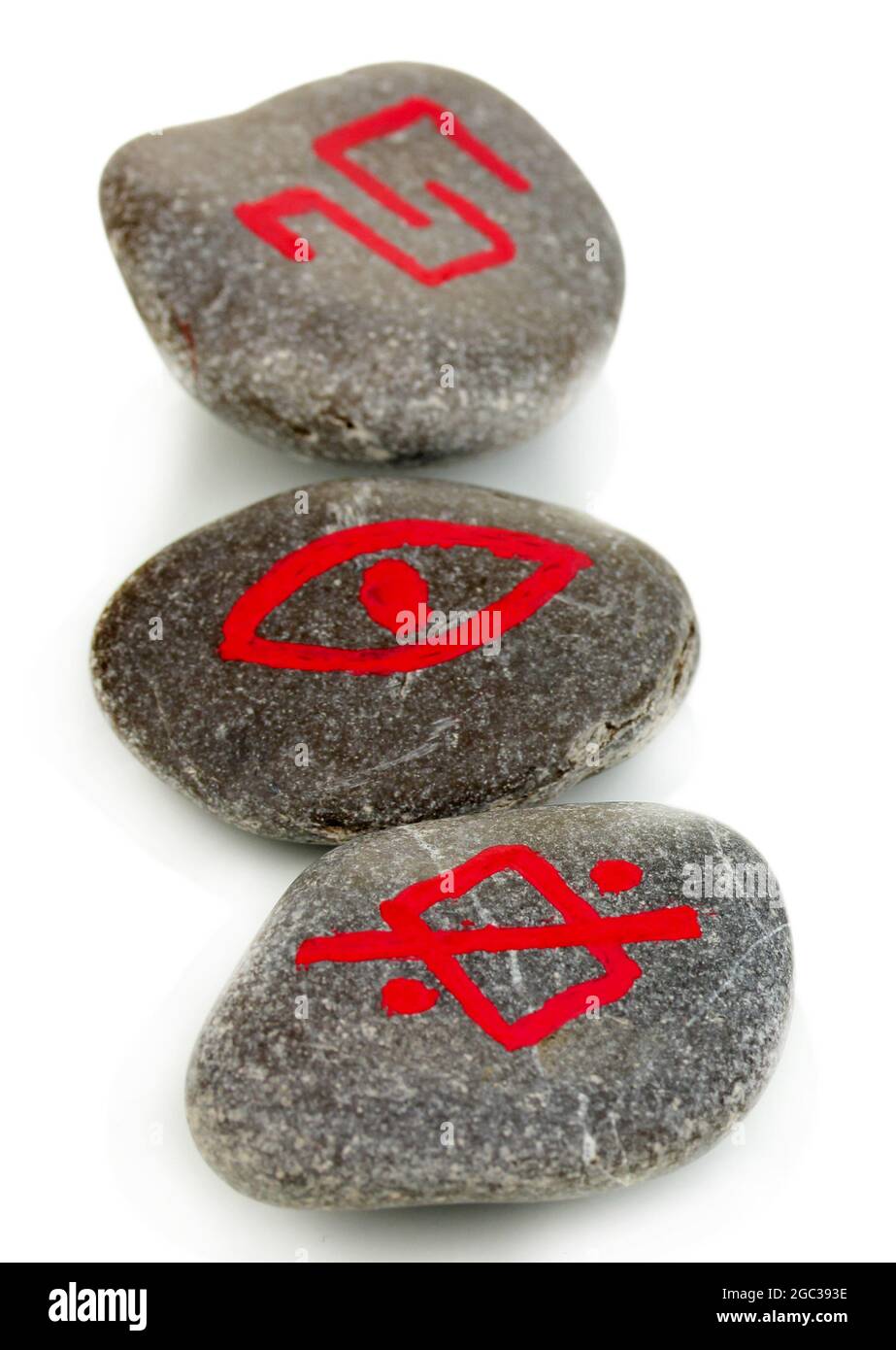 Fortune telling with symbols on stones isolated on white Stock Photo ...