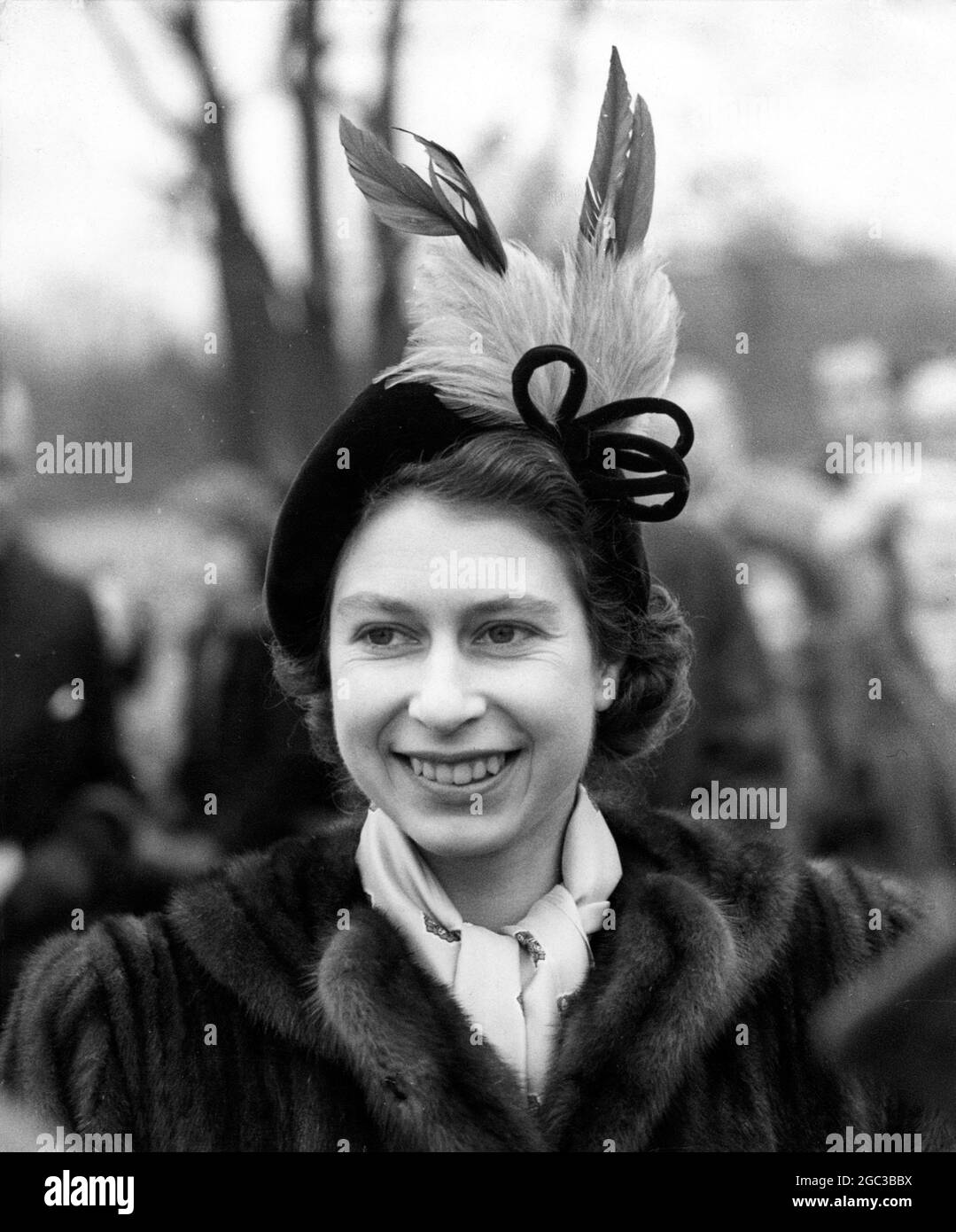 Princess Elizabeth wearing a hat with sprightly feathers and a ...