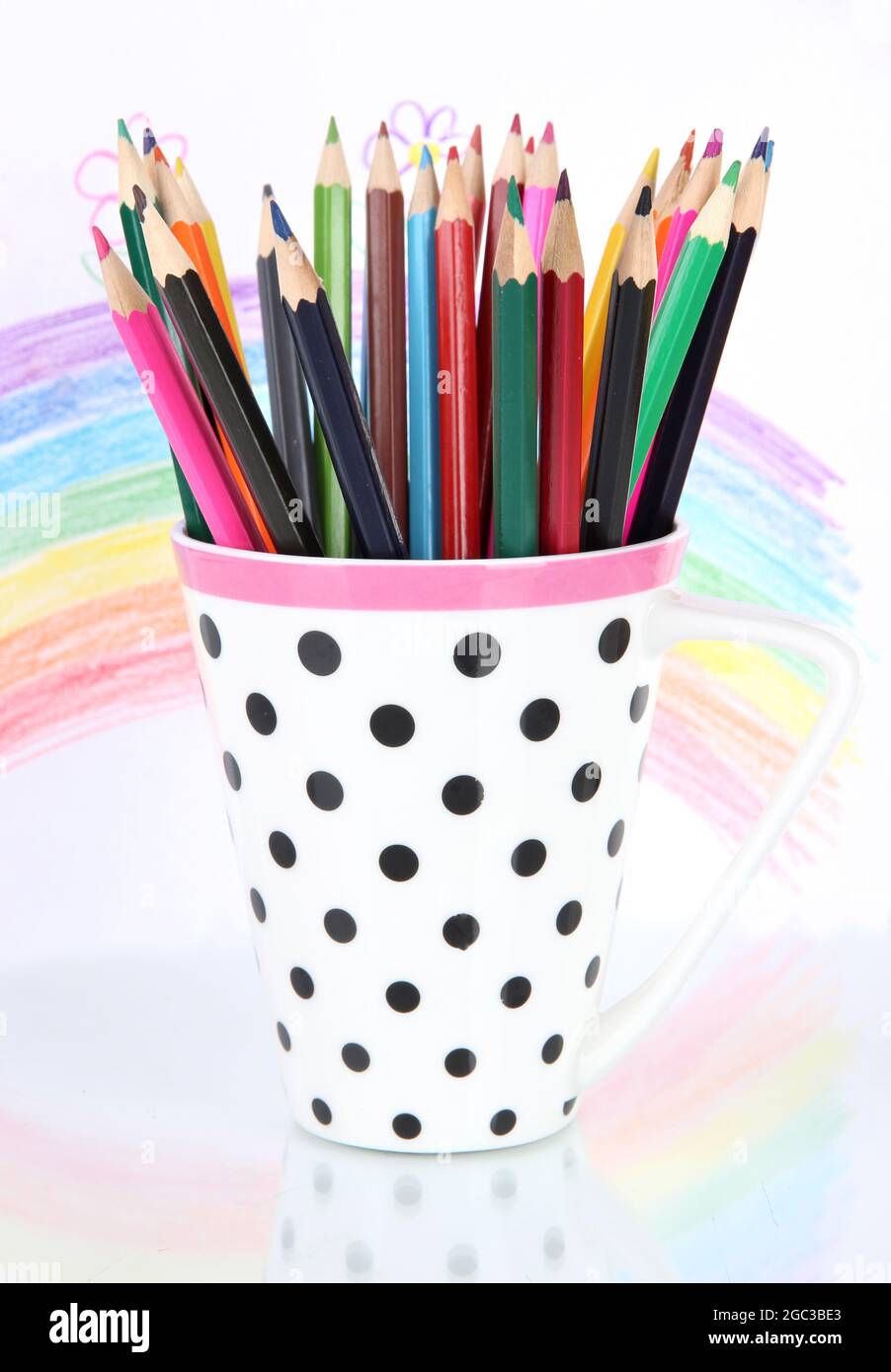 Colorful pencils in cup isolated on white Stock Photo - Alamy