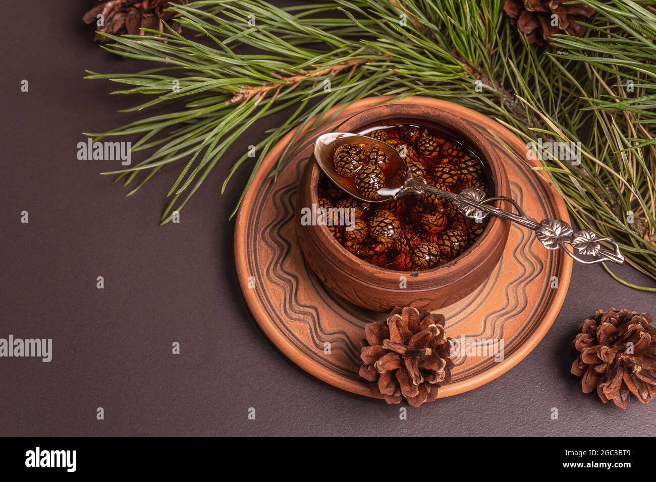 Sweet pine cone jam. Traditional Siberian dessert, fresh evergreen ...