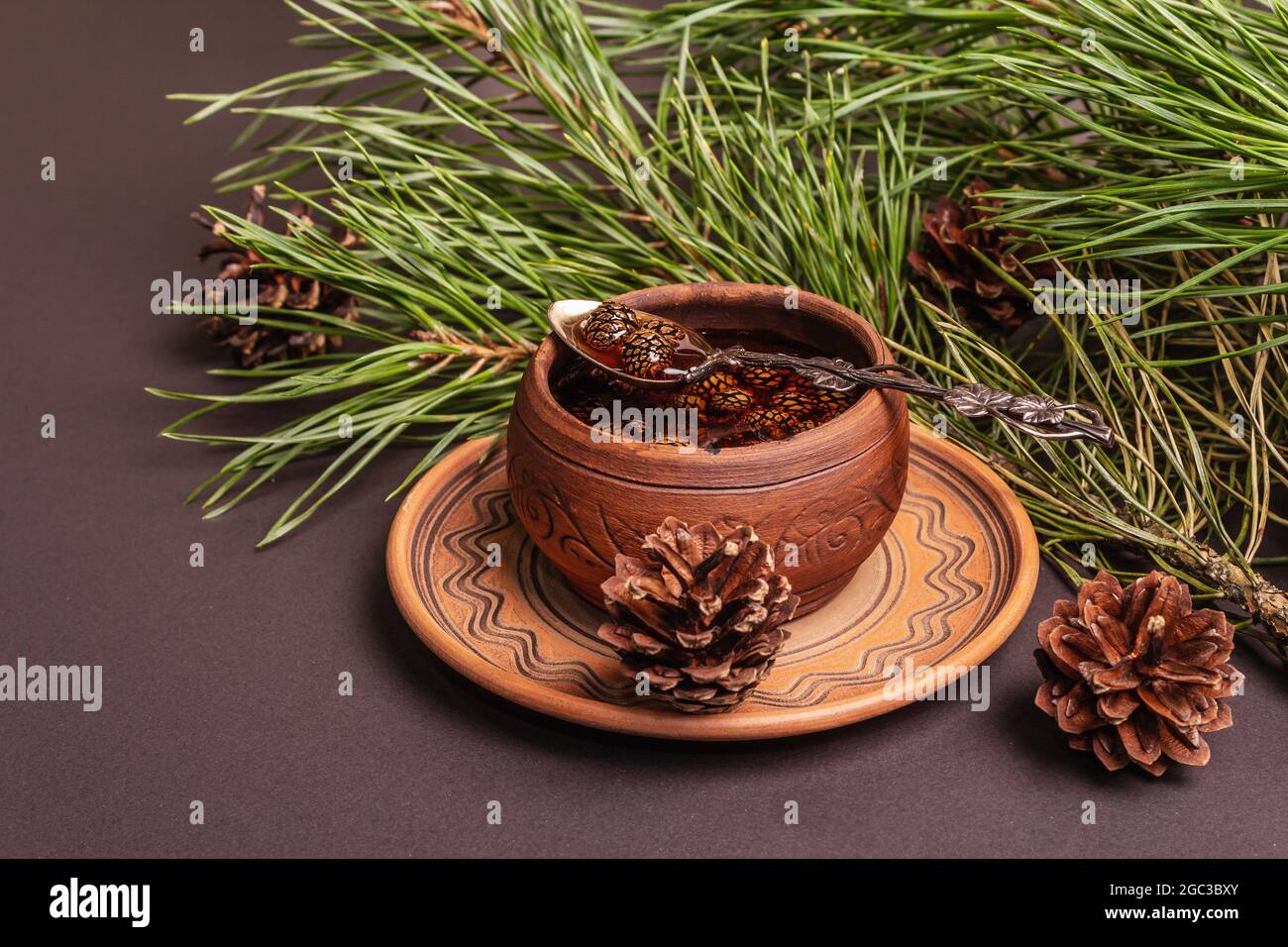 Sweet pine cone jam. Traditional Siberian dessert, fresh evergreen ...