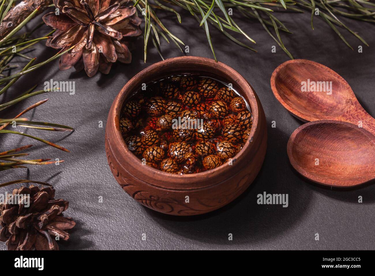 Sweet pine cone jam. Traditional Siberian dessert, fresh evergreen ...