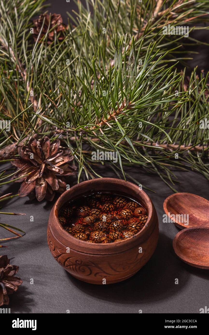 Sweet pine cone jam. Traditional Siberian dessert, fresh evergreen ...