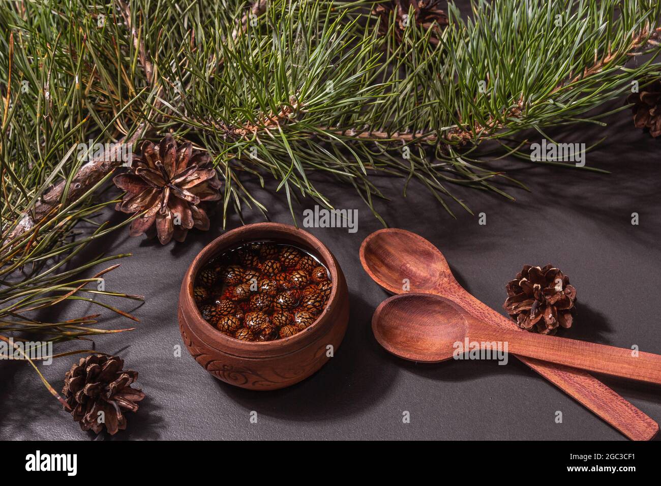 Sweet pine cone jam. Traditional Siberian dessert, fresh evergreen ...