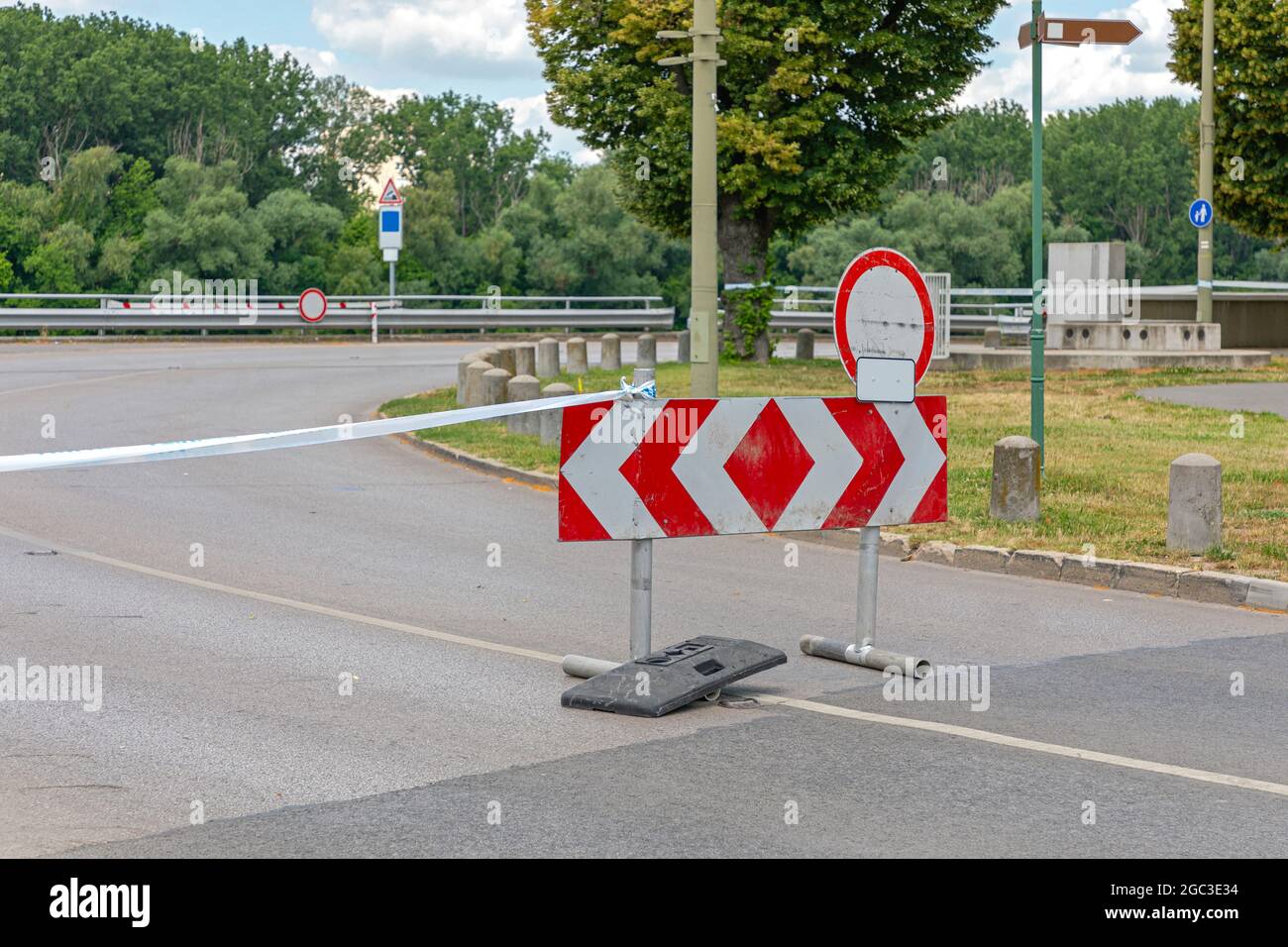 Barrier Sign at Middle of Street Temporary Road Closure Stock Photo - Alamy