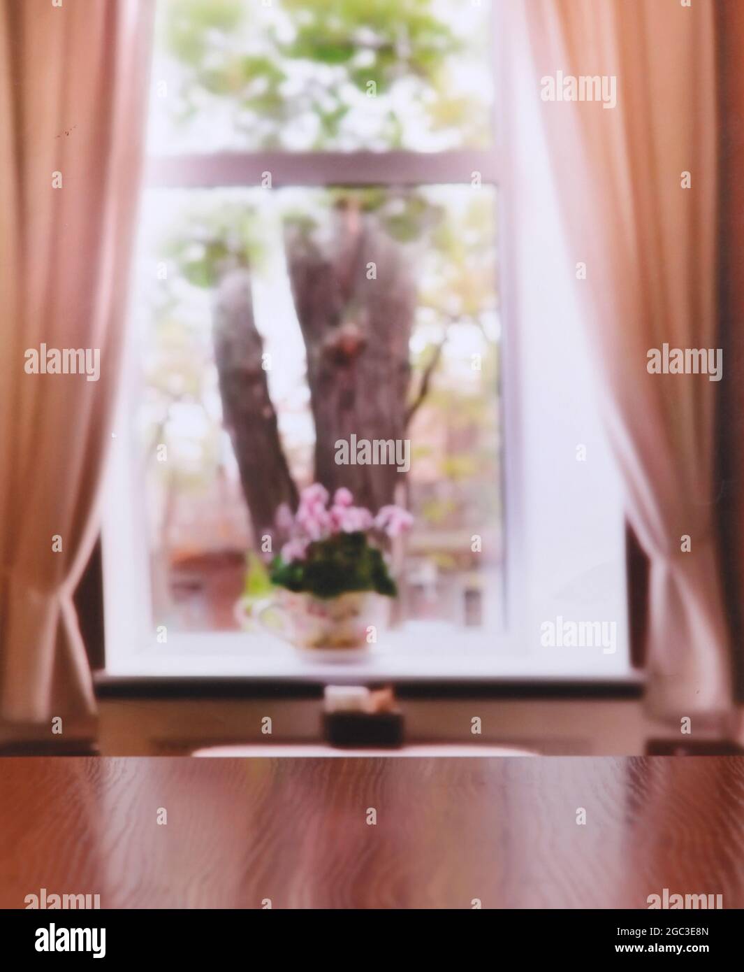 Wooden table on room background Stock Photo - Alamy