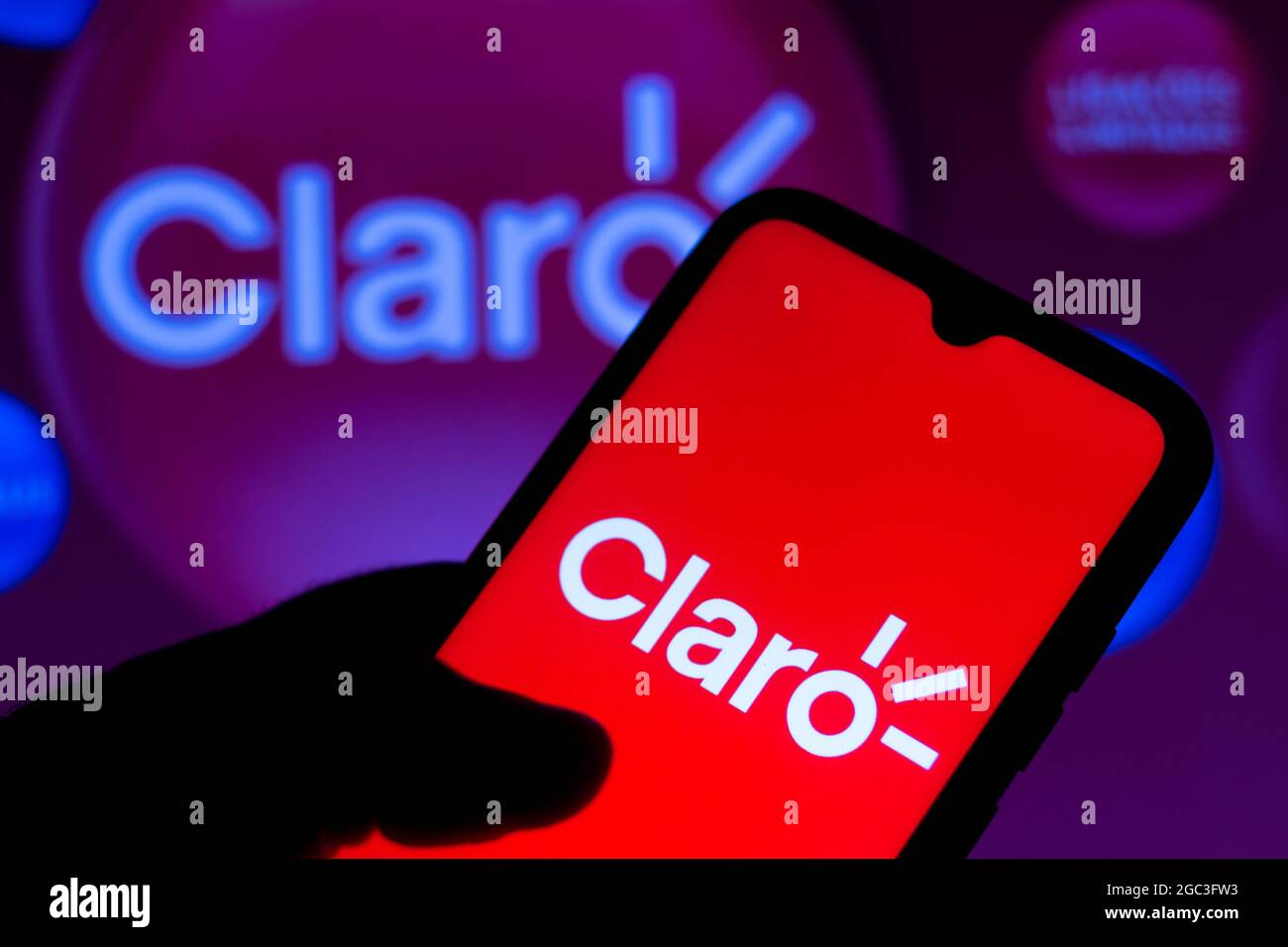 In this photo illustration, the Claro logo seen displayed on a ...