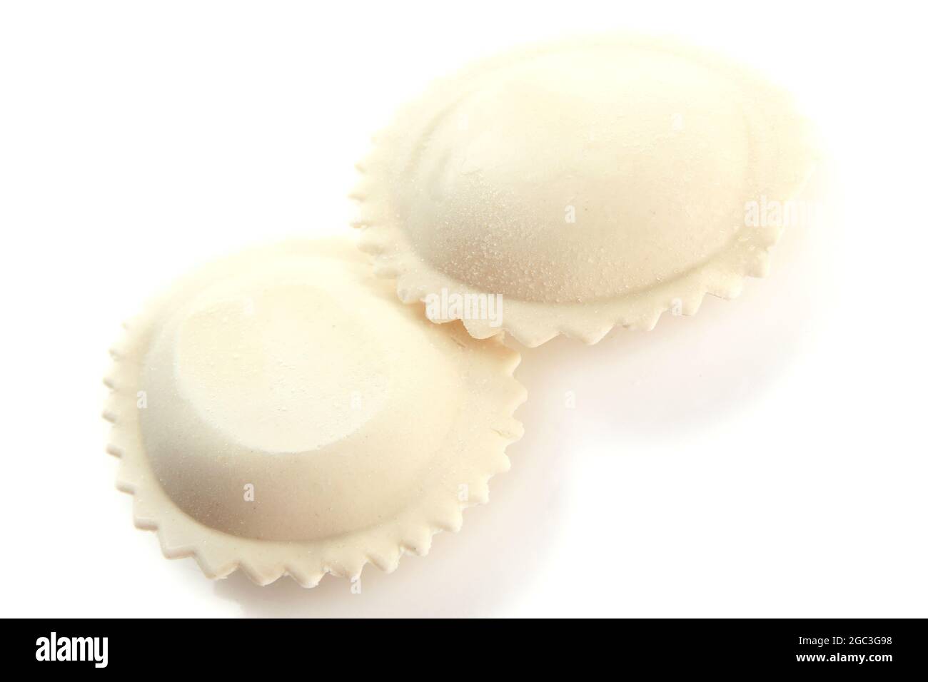 Raw dumplings, isolated on white Stock Photo - Alamy