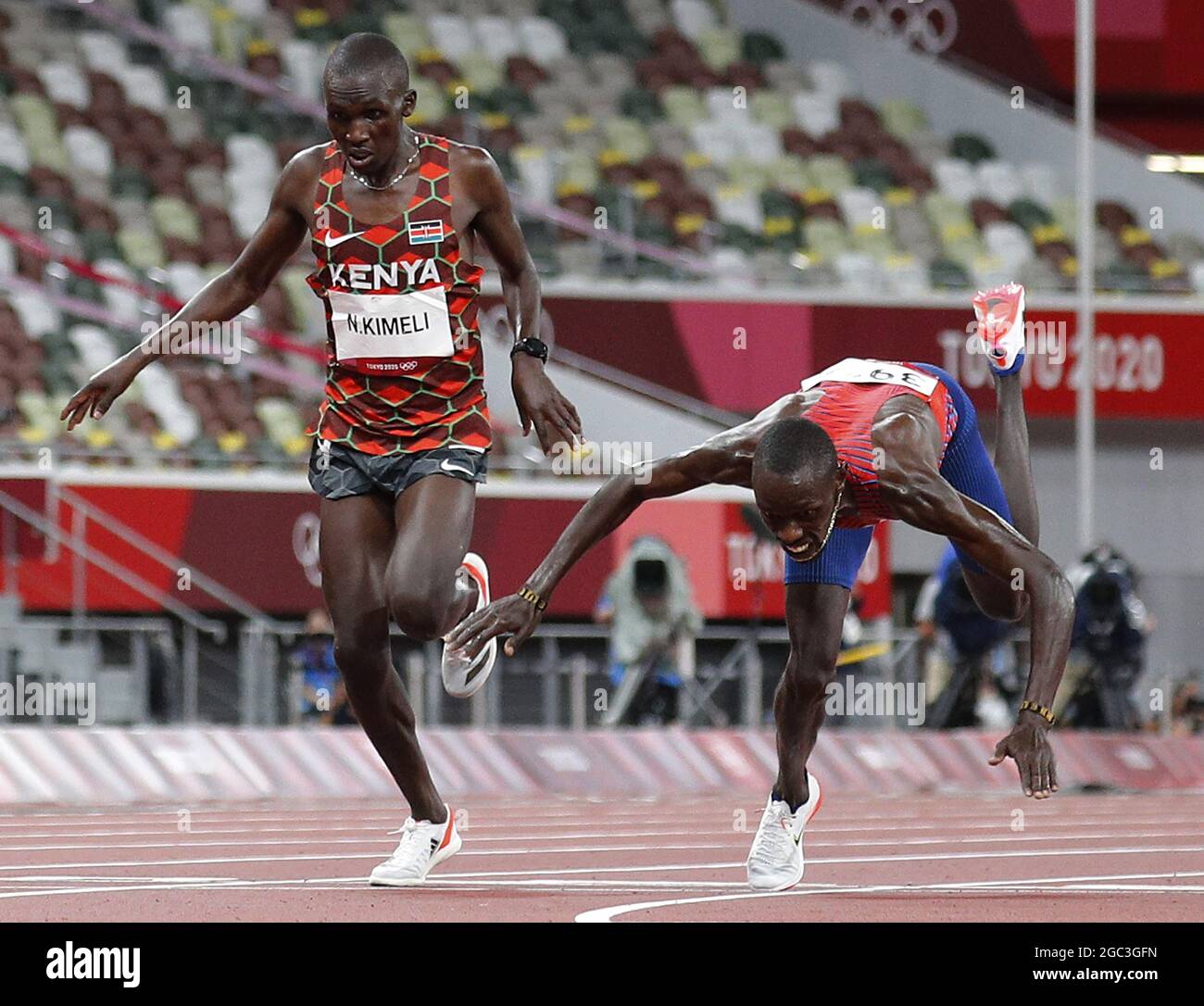 Tokyo, Japan. 06th Aug, 2021. Paul Chelimo of the USA (R) falls as he ...