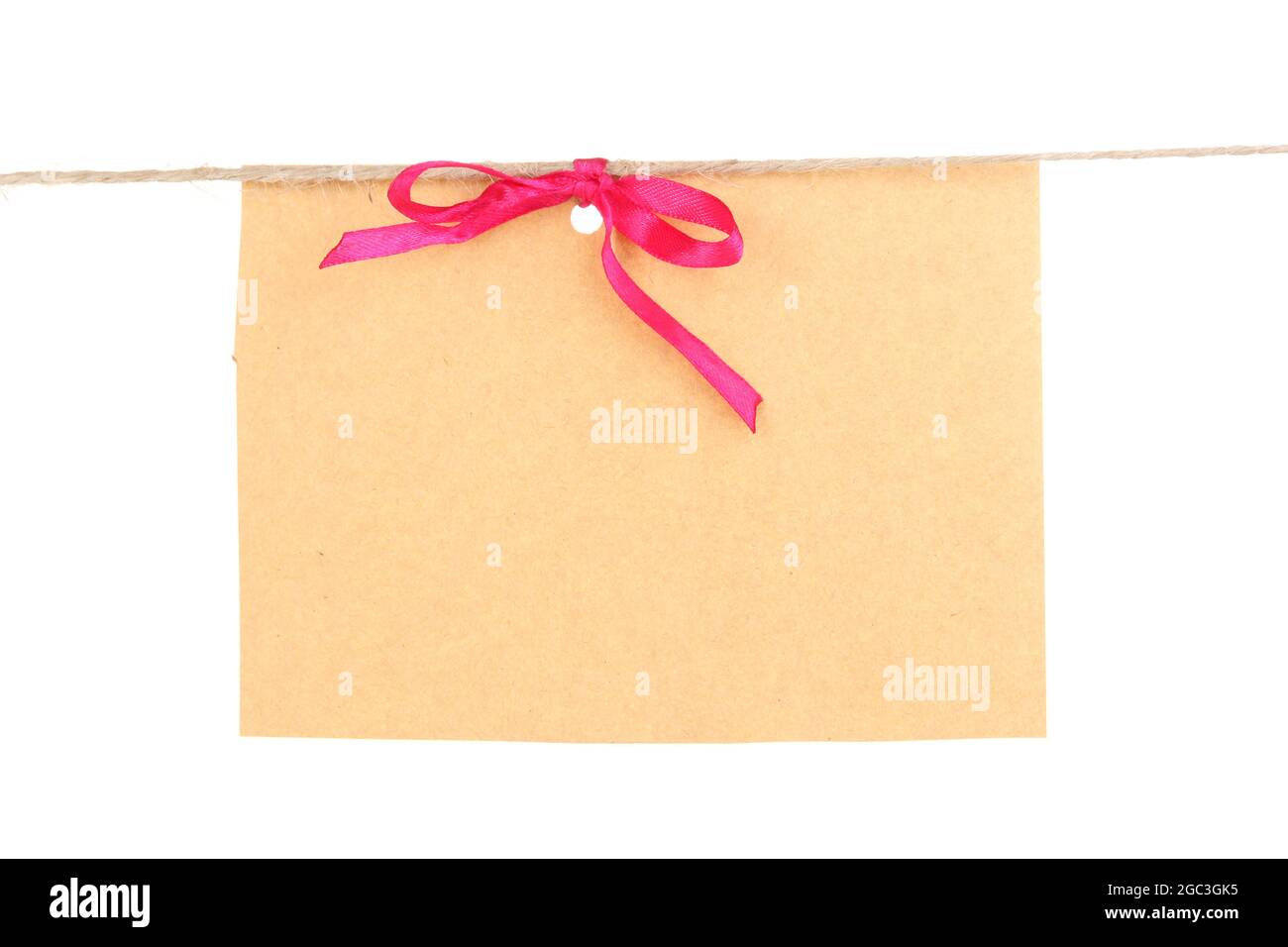 Old sheet of paper hanging on rope isolated on white Stock Photo - Alamy