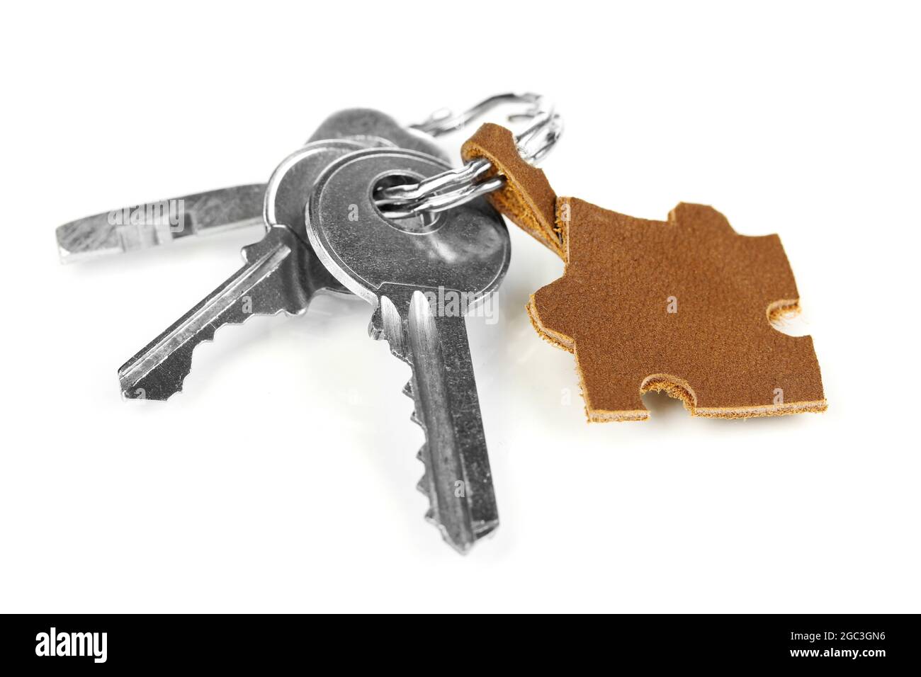 Key with leather trinket isolated on white Stock Photo - Alamy