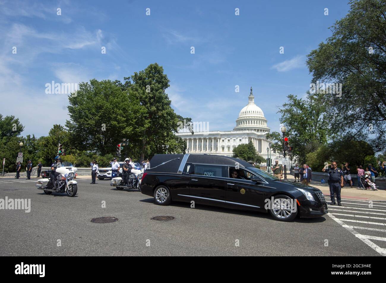 Washington DC, USA. 06th Aug, 2021. A motorcade carrying the remains of ...