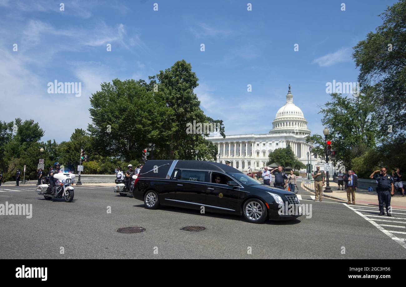 Washington DC, USA. 06th Aug, 2021. A motorcade carrying the remains of ...