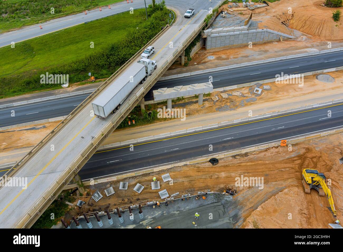Overhead view of under construction works in highways of a bridge over ...