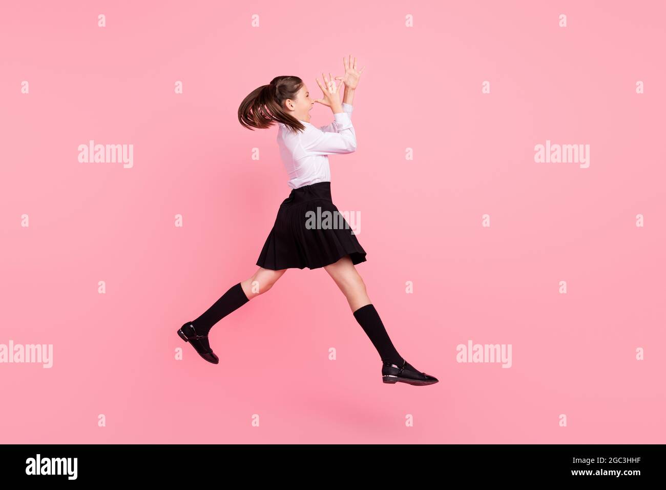 Full length profile side photo of young little girl jump nose teasing ...