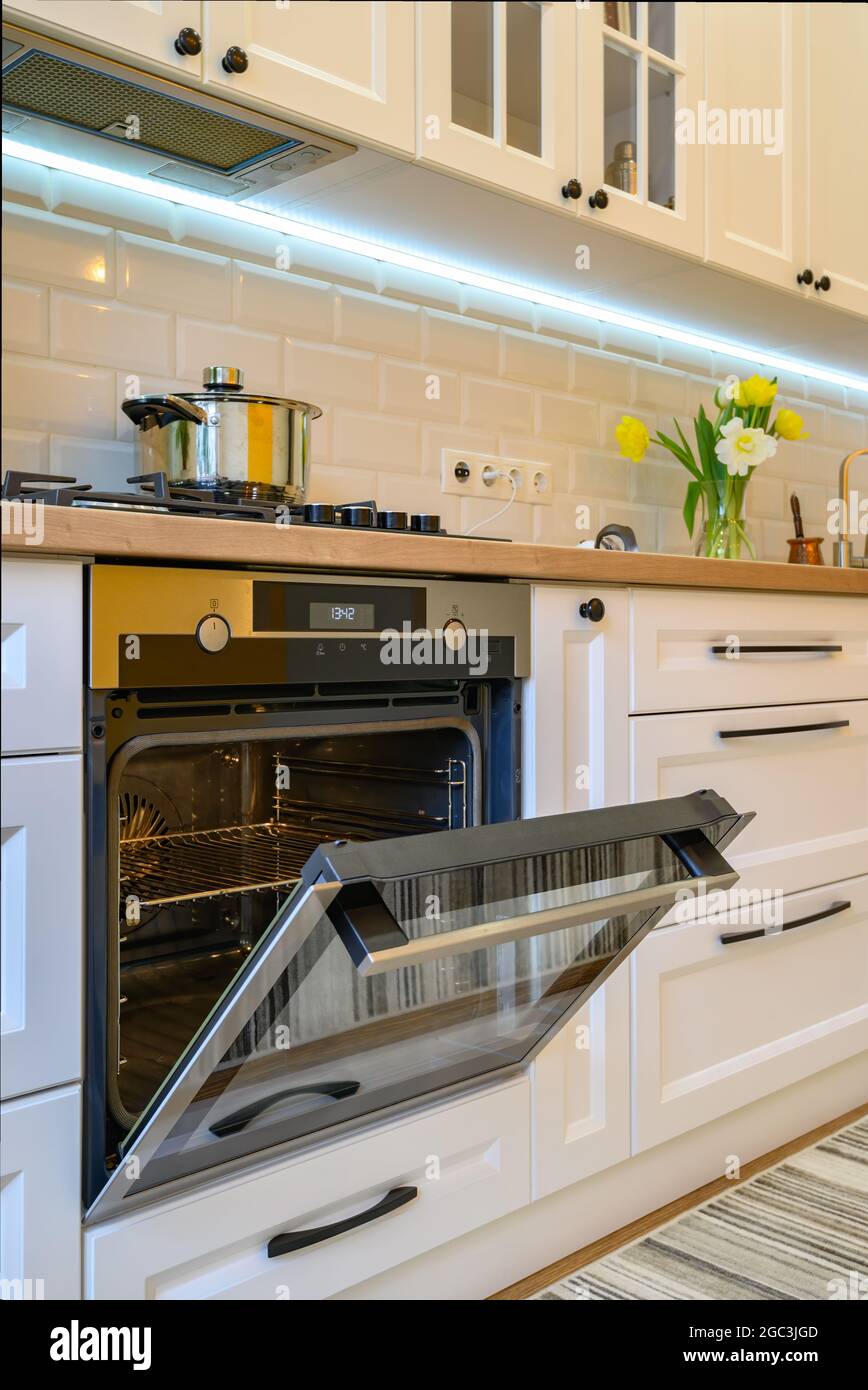 cozy modern well designed kitchen interior Stock Photo - Alamy