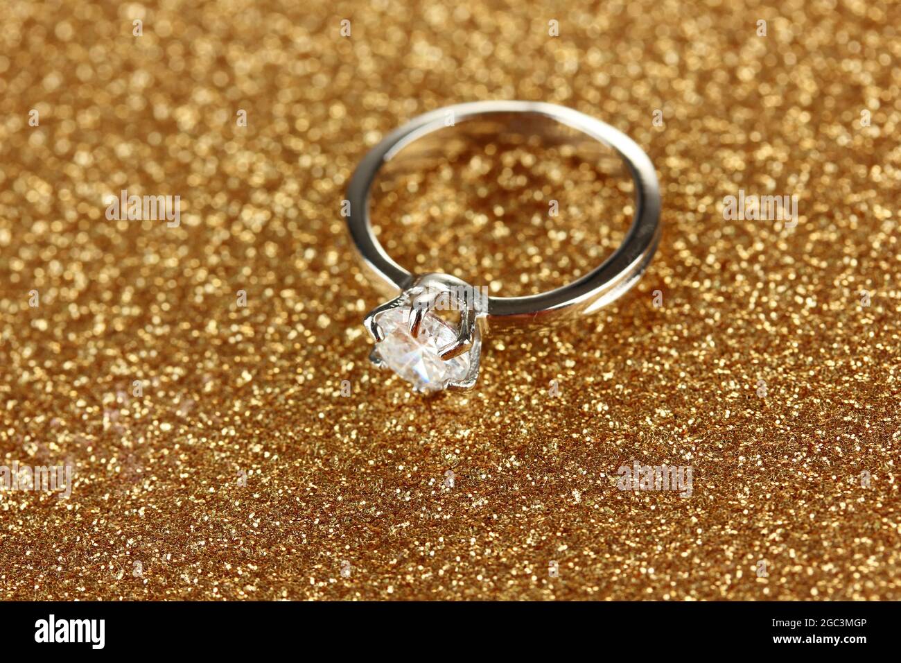 Ring on bright background Stock Photo - Alamy