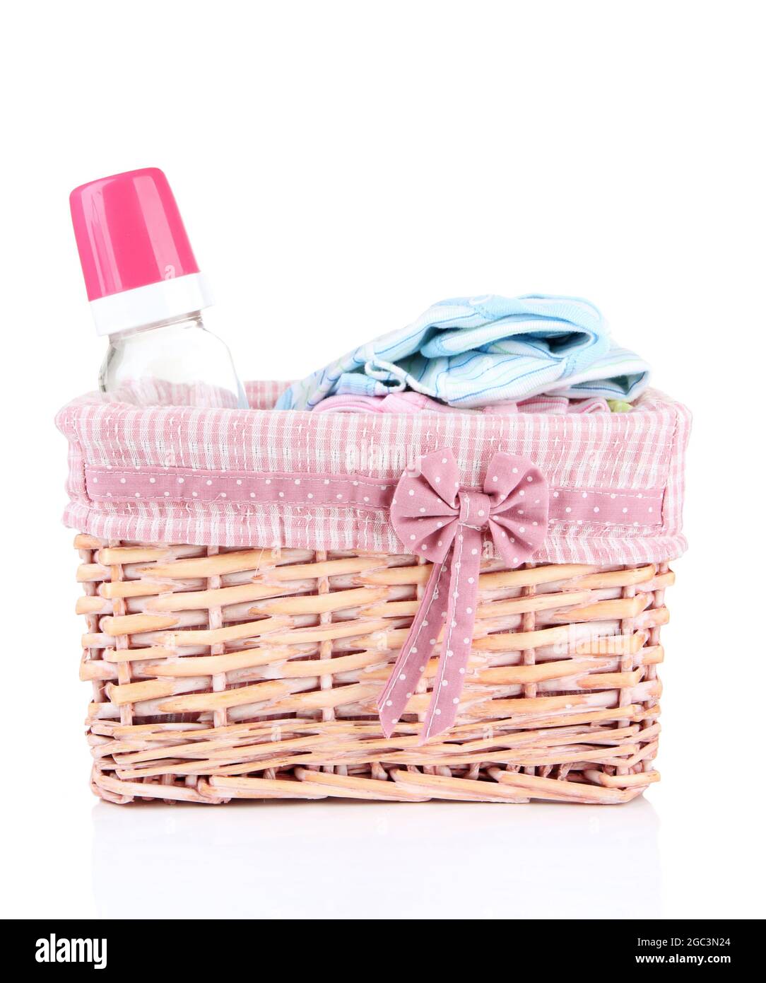 Beautiful basket of baby clothes isolated on white Stock Photo - Alamy
