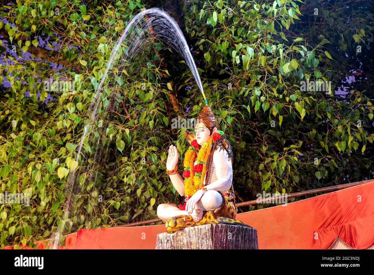 Statue of Indian Lord Shankar coming out of the Ganges from the hairs ...