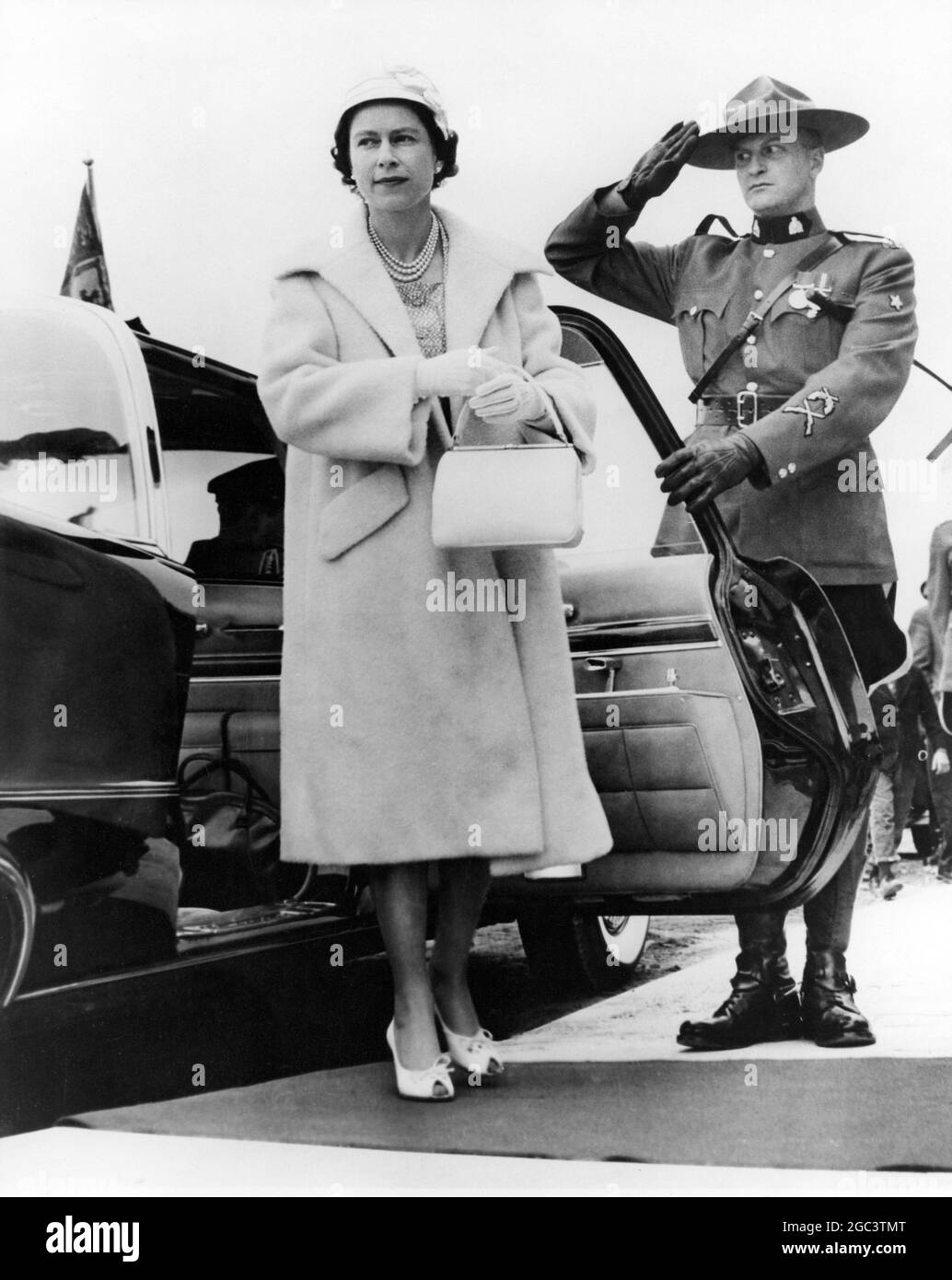 Royal Tour of Canada H.M The Queen is given a salute from a Mountie, a ...