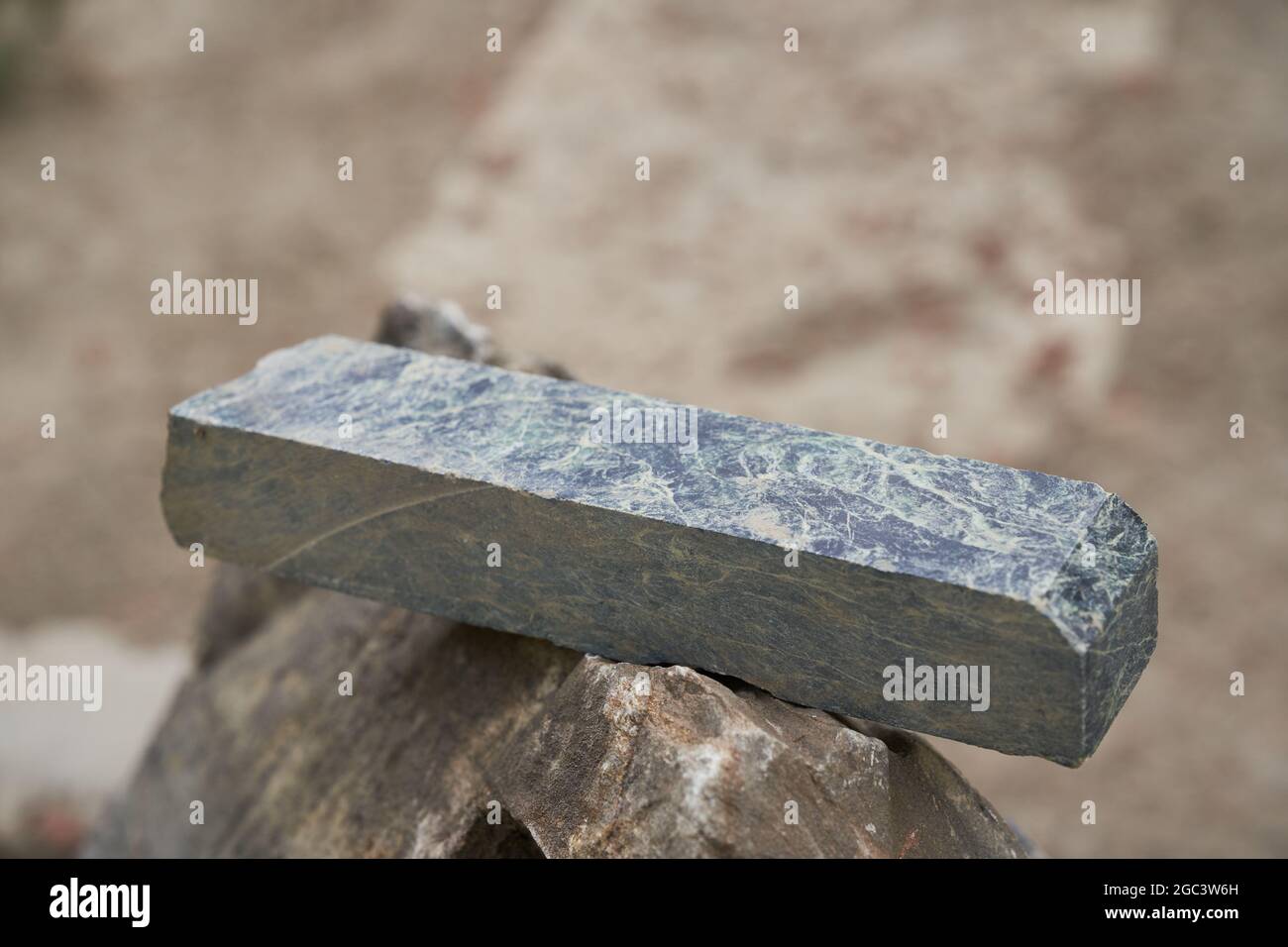 Stone podium display. A pedestal made of natural stone on a stone ...