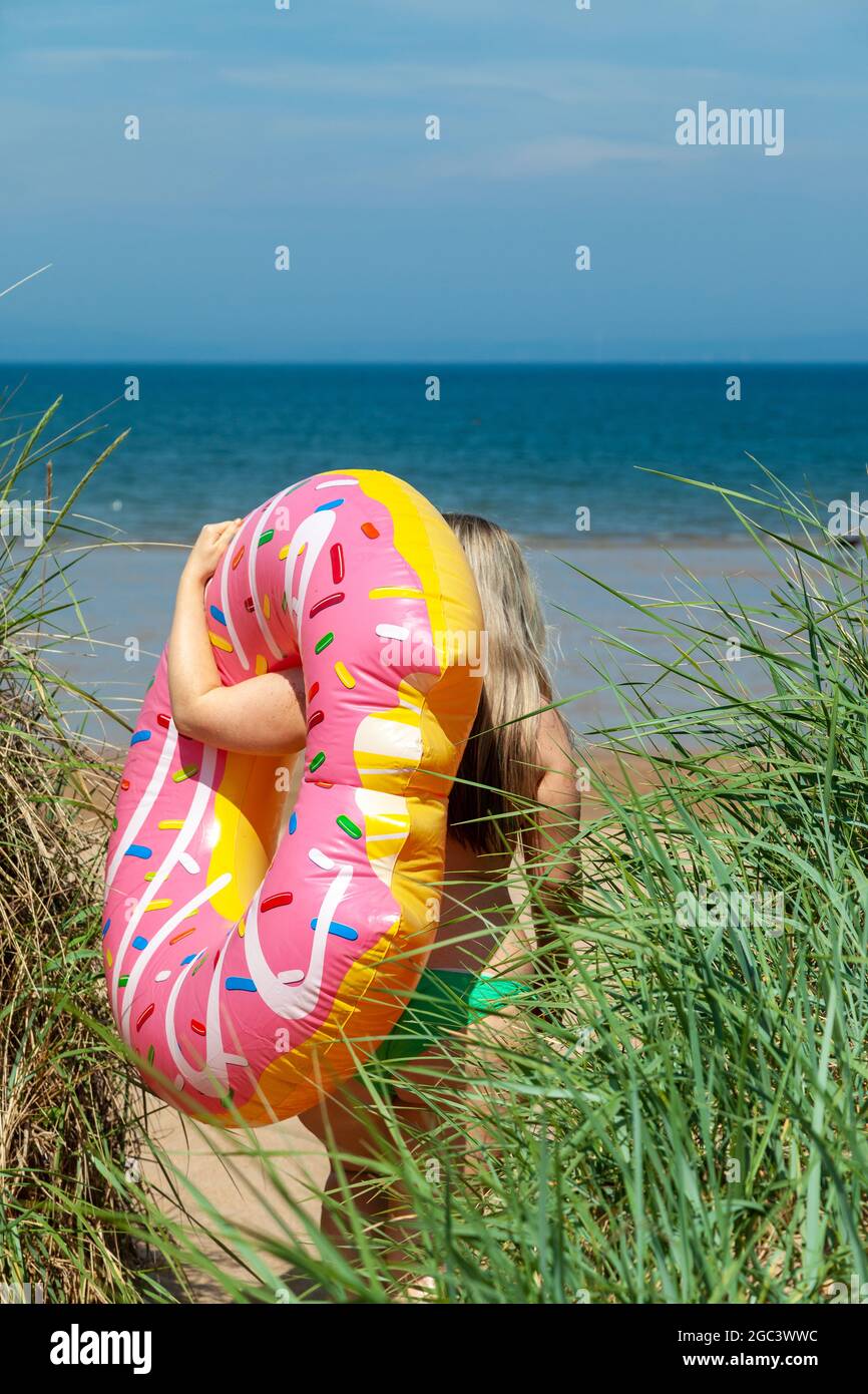 Inflatable donut ring hi-res stock photography and images - Alamy