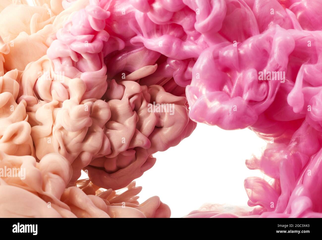 Ink in water on white background Stock Photo - Alamy