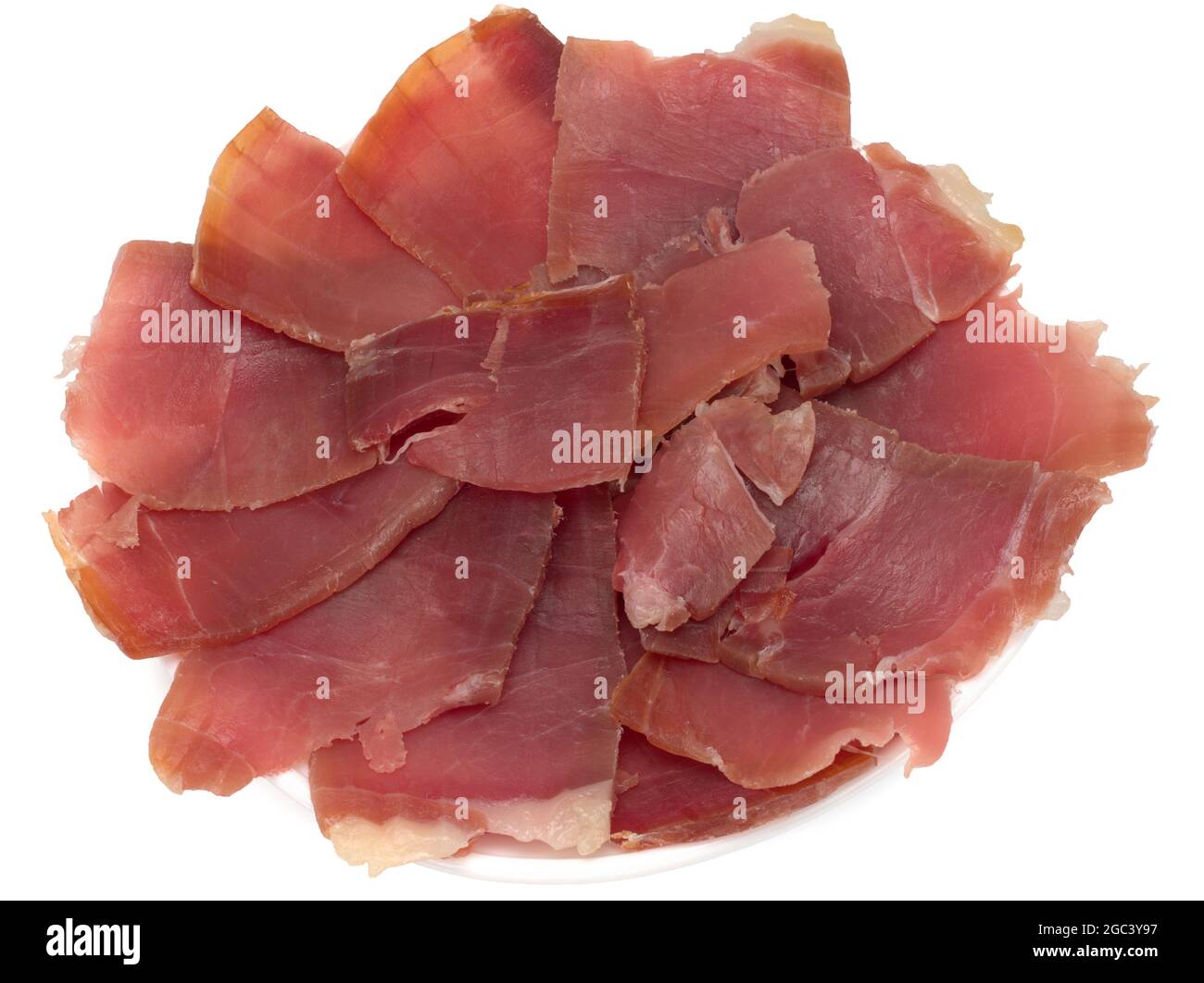 Spanish ham jamon , hand cut, sliced on a white Stock Photo - Alamy