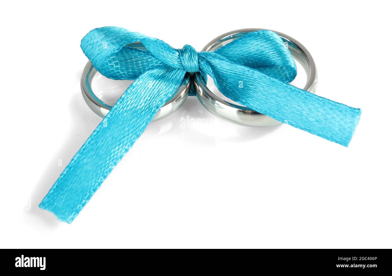 Wedding rings tied with ribbon isolated on white Stock Photo - Alamy