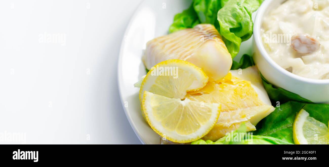 Steamed haddock fillet served with an exquisite salad consisting of ...