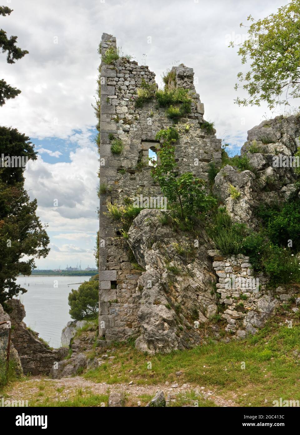Ruins of a tower of the old medieval Castle of Duino, near Trieste ...