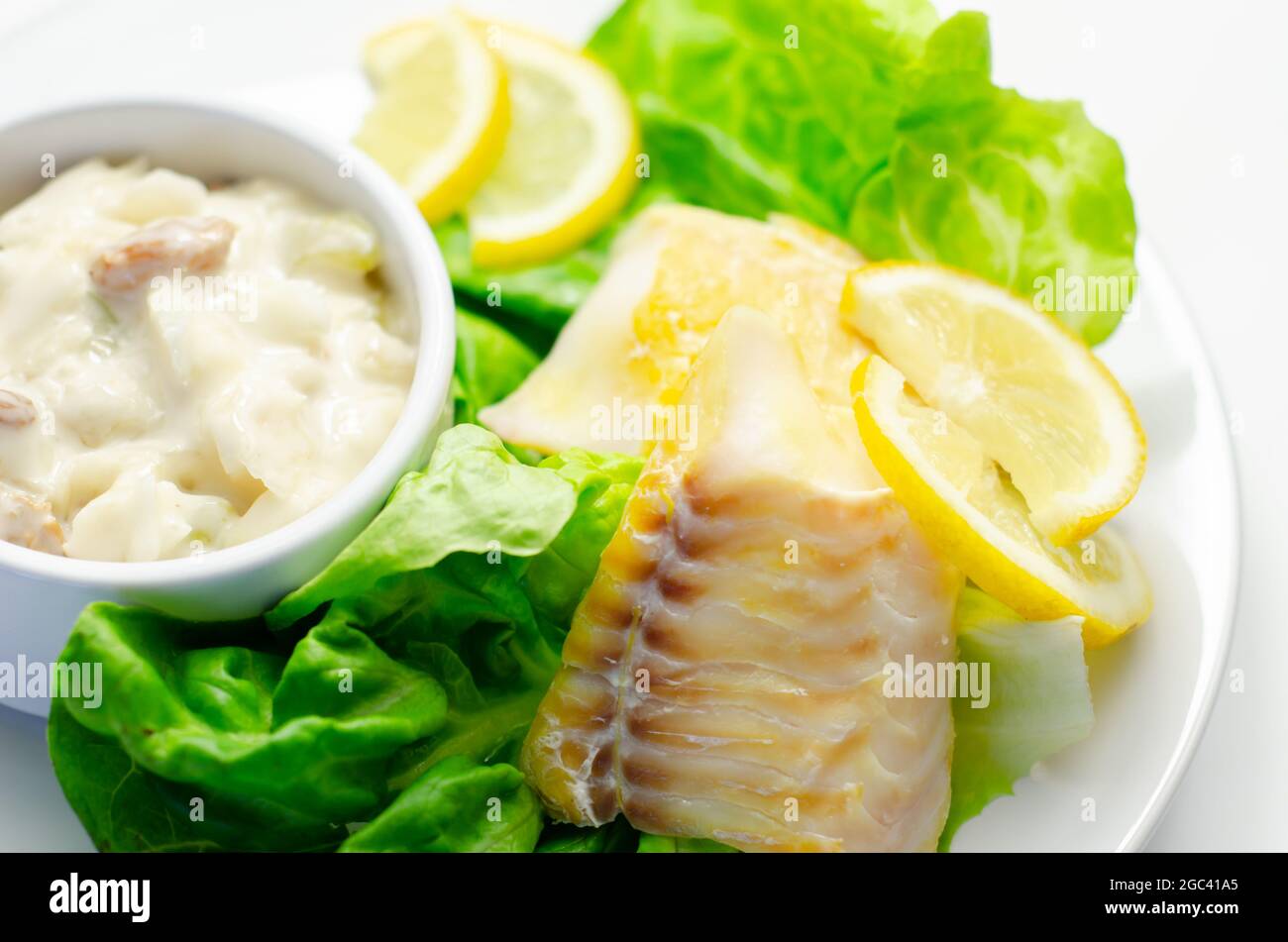 Steamed haddock fillet served with an exquisite salad consisting of ...