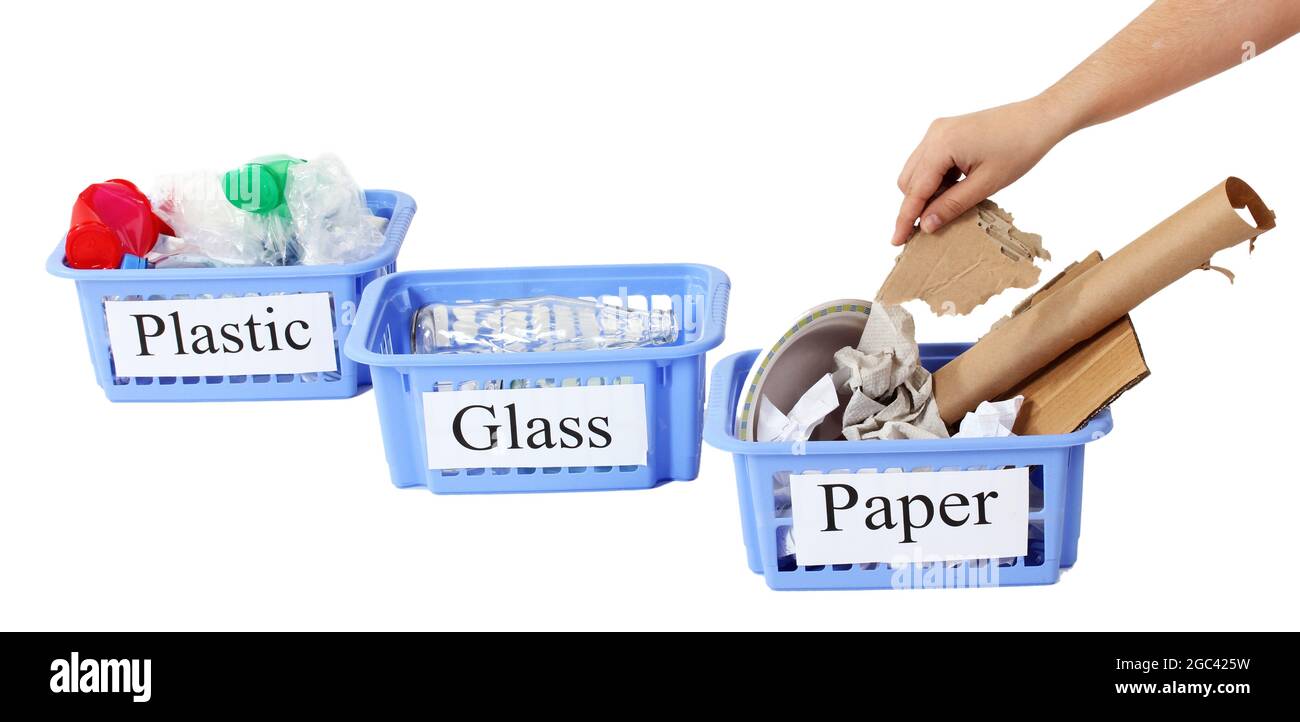 Three baskets of assorted debris isolated on white Stock Photo - Alamy