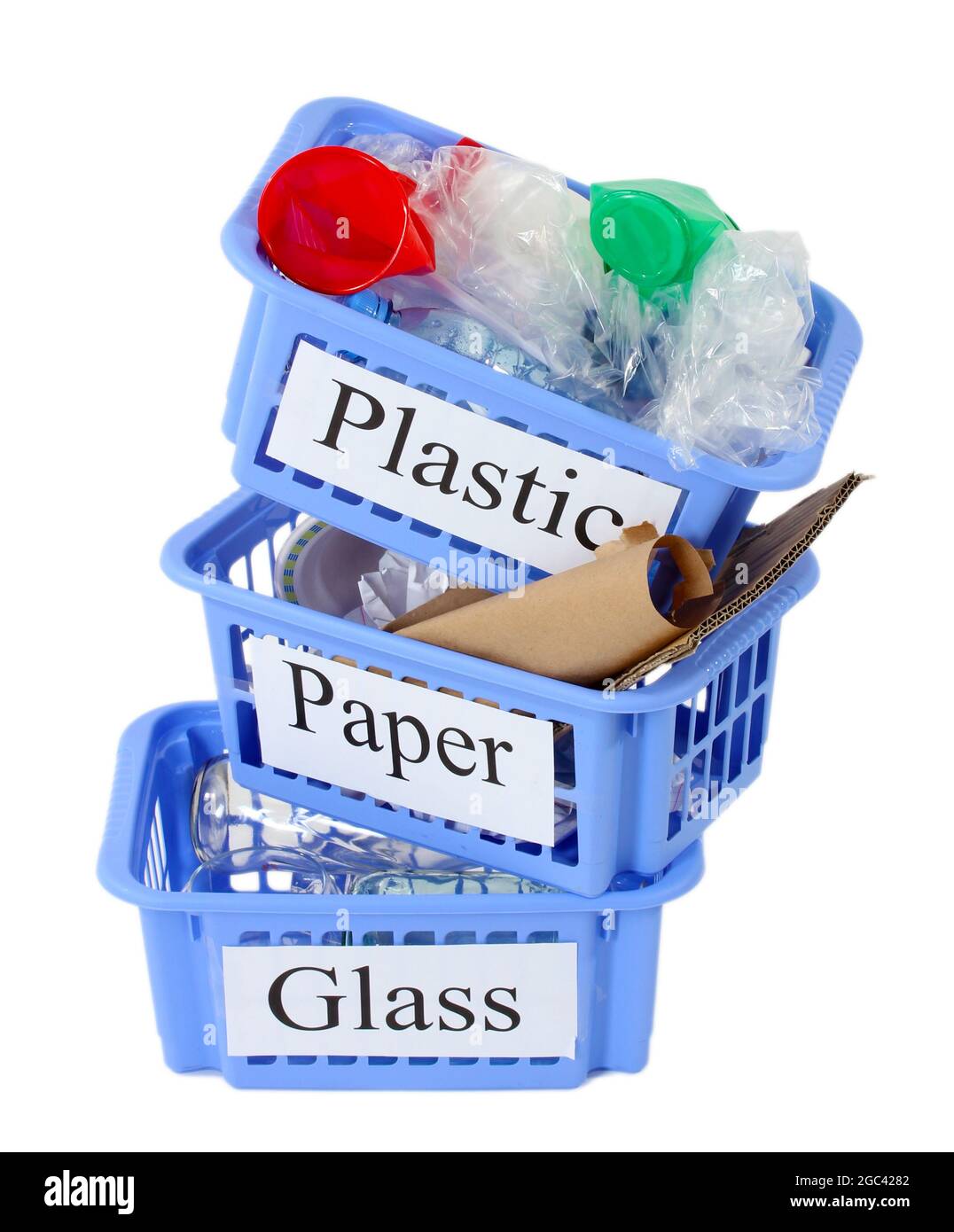 Three baskets of assorted debris isolated on white Stock Photo - Alamy