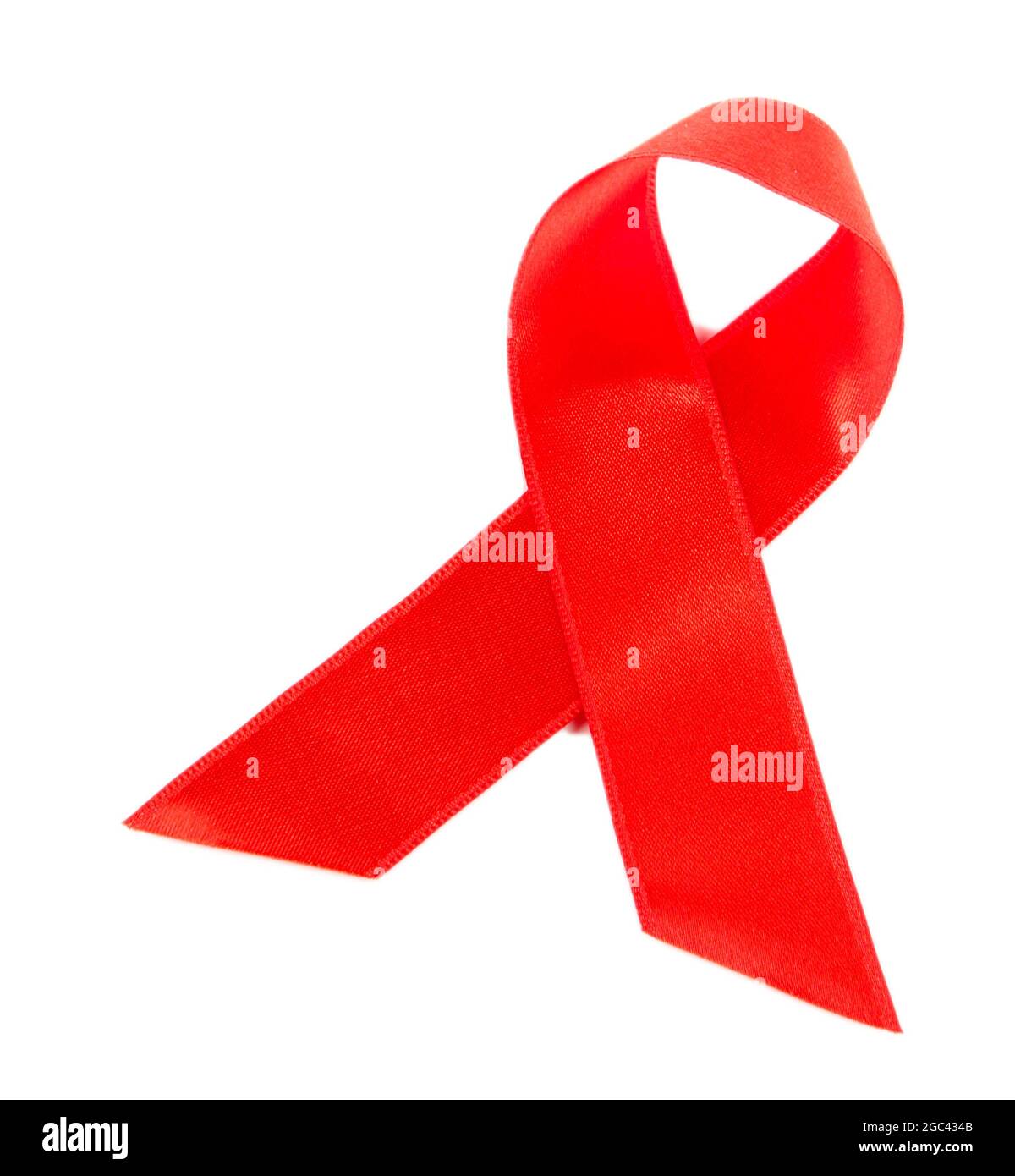 Red ribbon HIV, AIDS isolated on white Stock Photo - Alamy