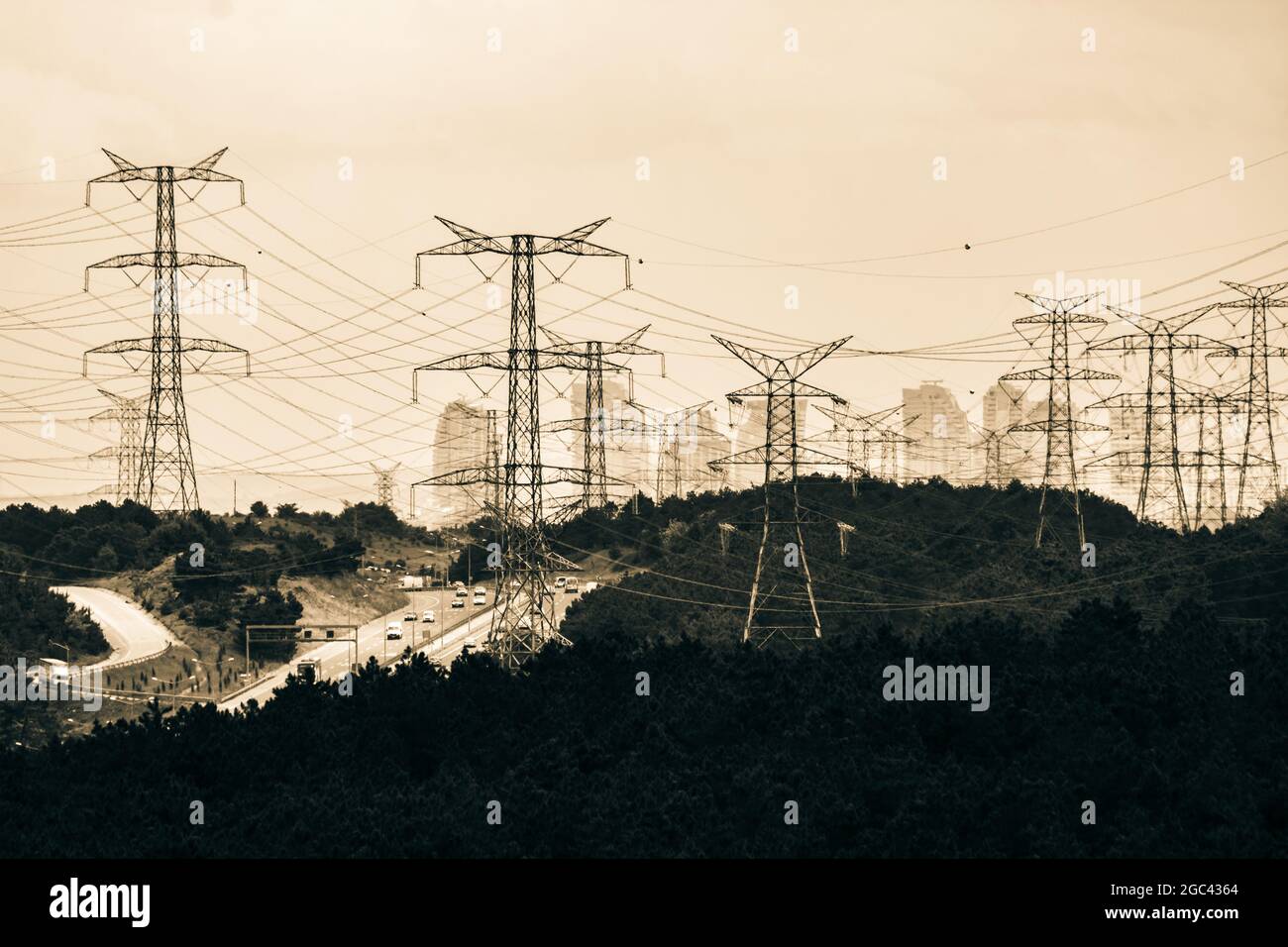 Grayscale photo of the power lines or electricity lines and city on the ...
